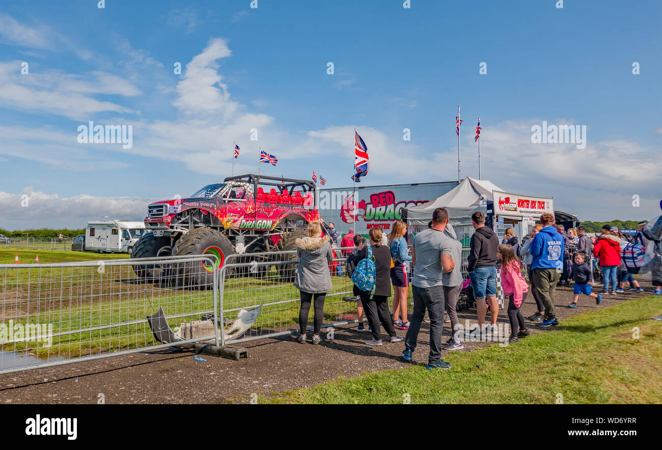 Queuing to ride the Red Dragon monster truck at the Monster Truck ...