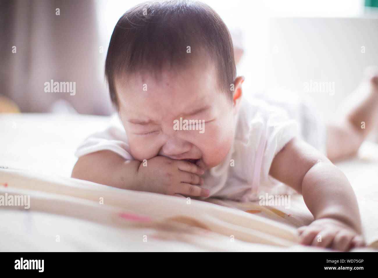 Indian baby crying hi-res stock photography and images - Alamy