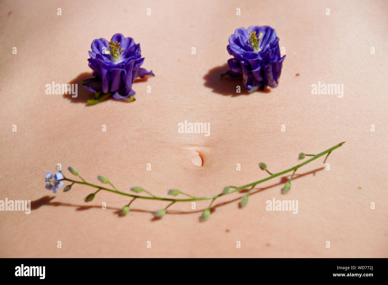 Belly flowers hi-res stock photography and images - Alamy