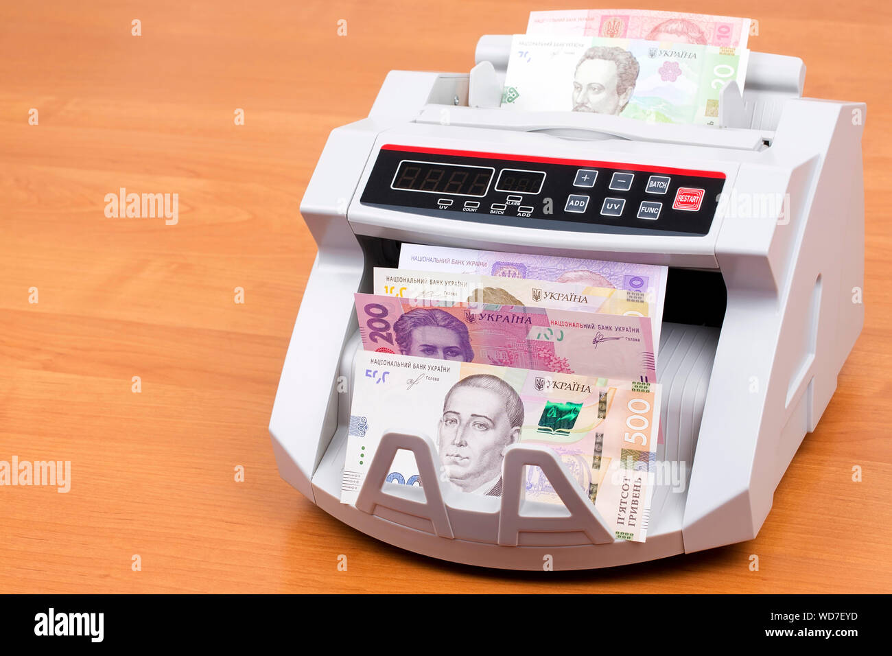 Counting ukrainian hryvnia hi-res stock photography and images - Alamy
