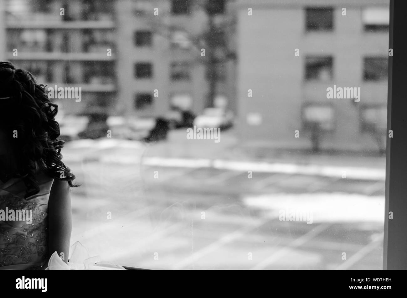 Woman at window rear view Black and White Stock Photos & Images - Alamy