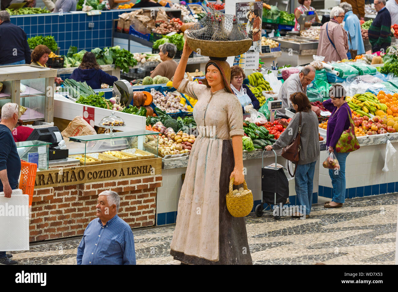 Statue of a varina inside the Mercado do Livramento food market in ...