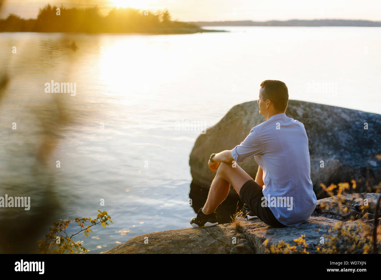 Sitting rock hi-res stock photography and images - Alamy