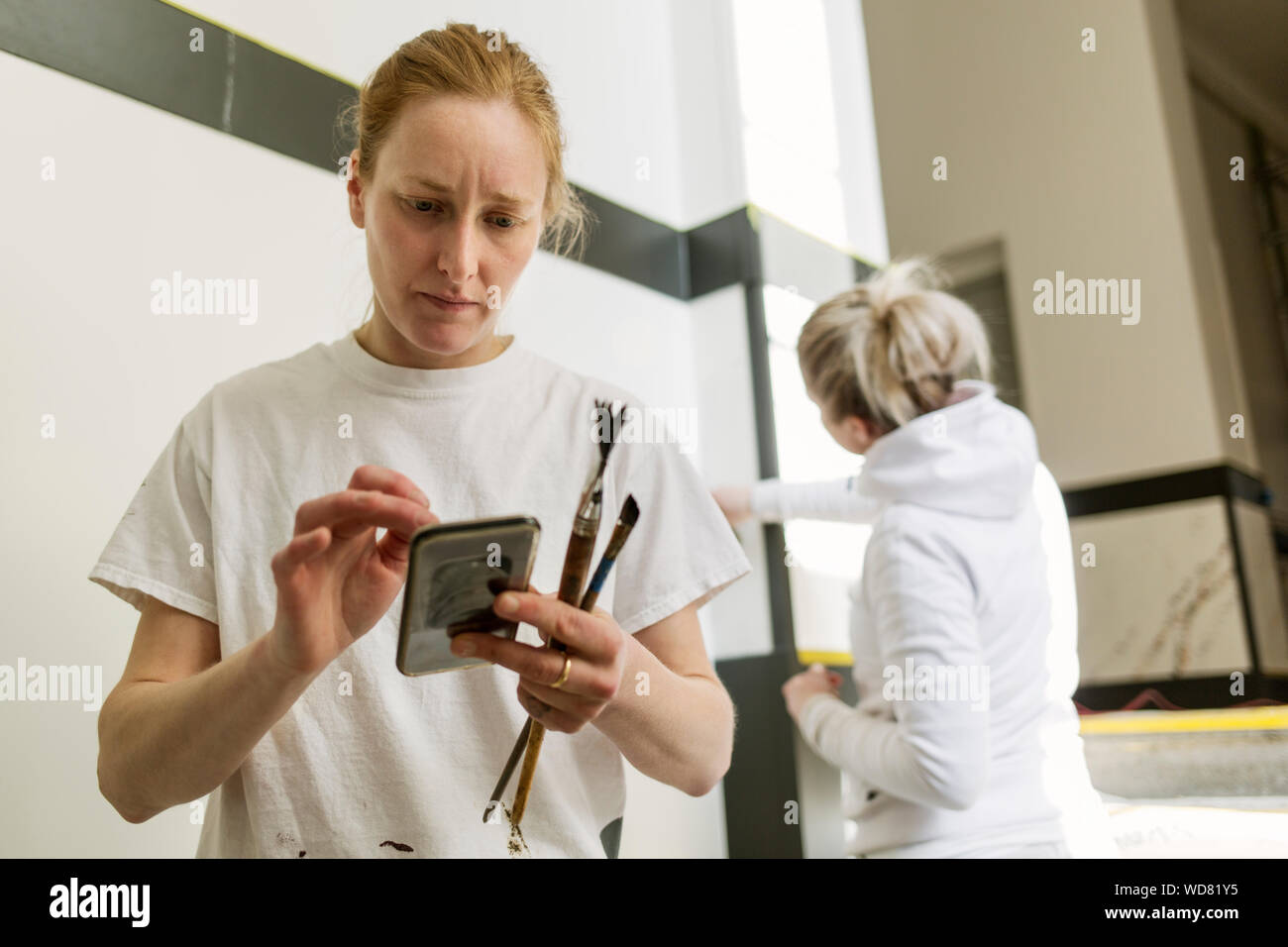 Checking your appearance hi-res stock photography and images - Alamy