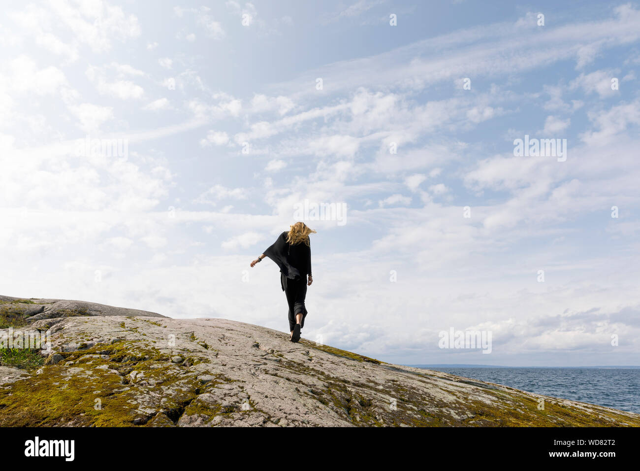 Woman windswept hi-res stock photography and images - Alamy