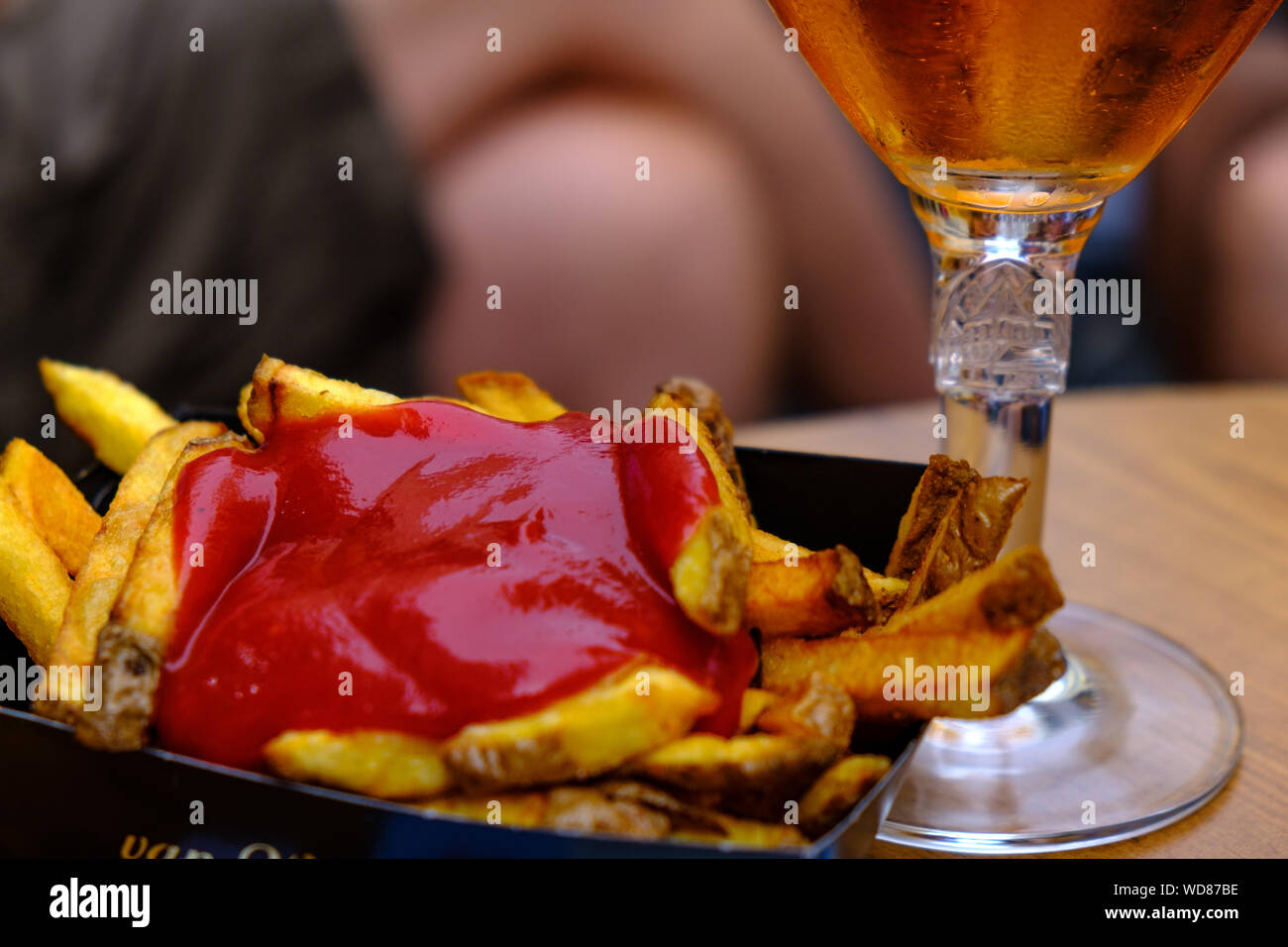 Street food. Belgian fries, pommes frites and beer Stock Photo - Alamy