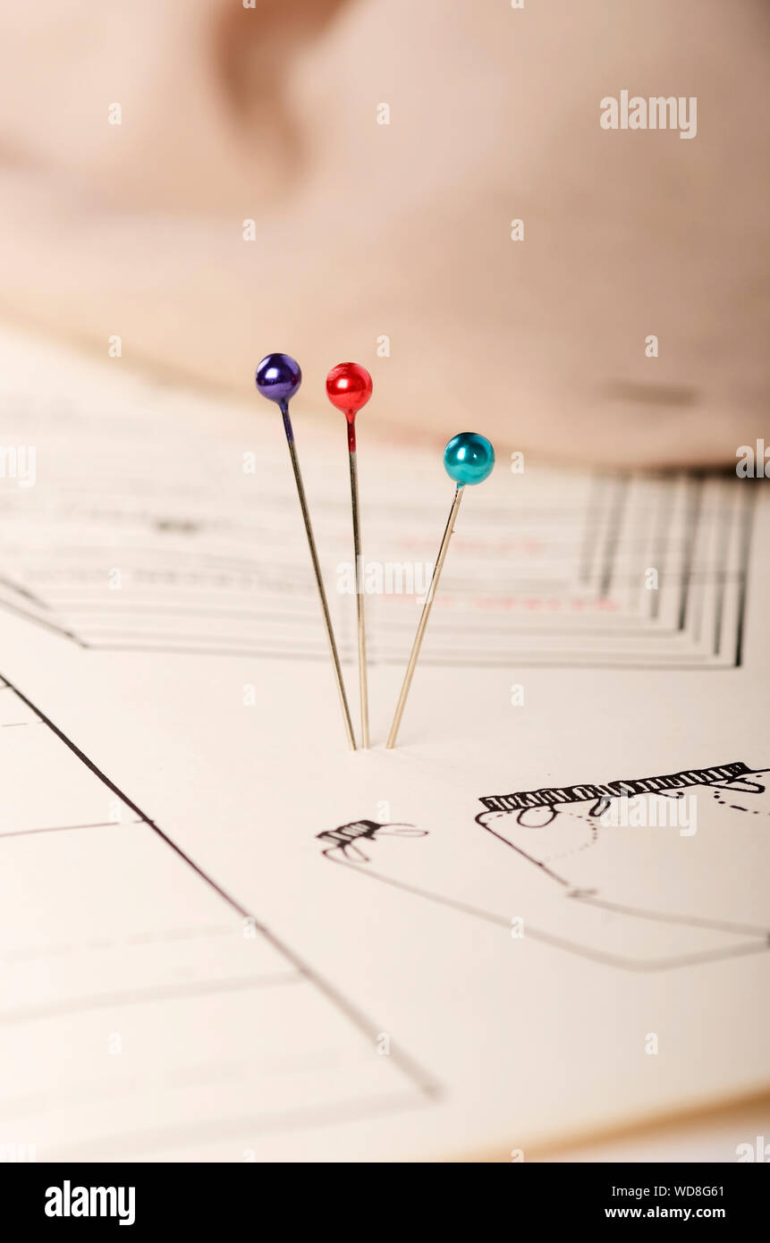 Pattern, fabric and pins Stock Photo - Alamy