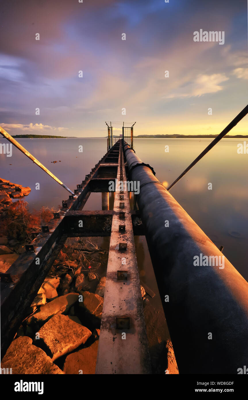 Pipe over river people hi-res stock photography and images - Alamy