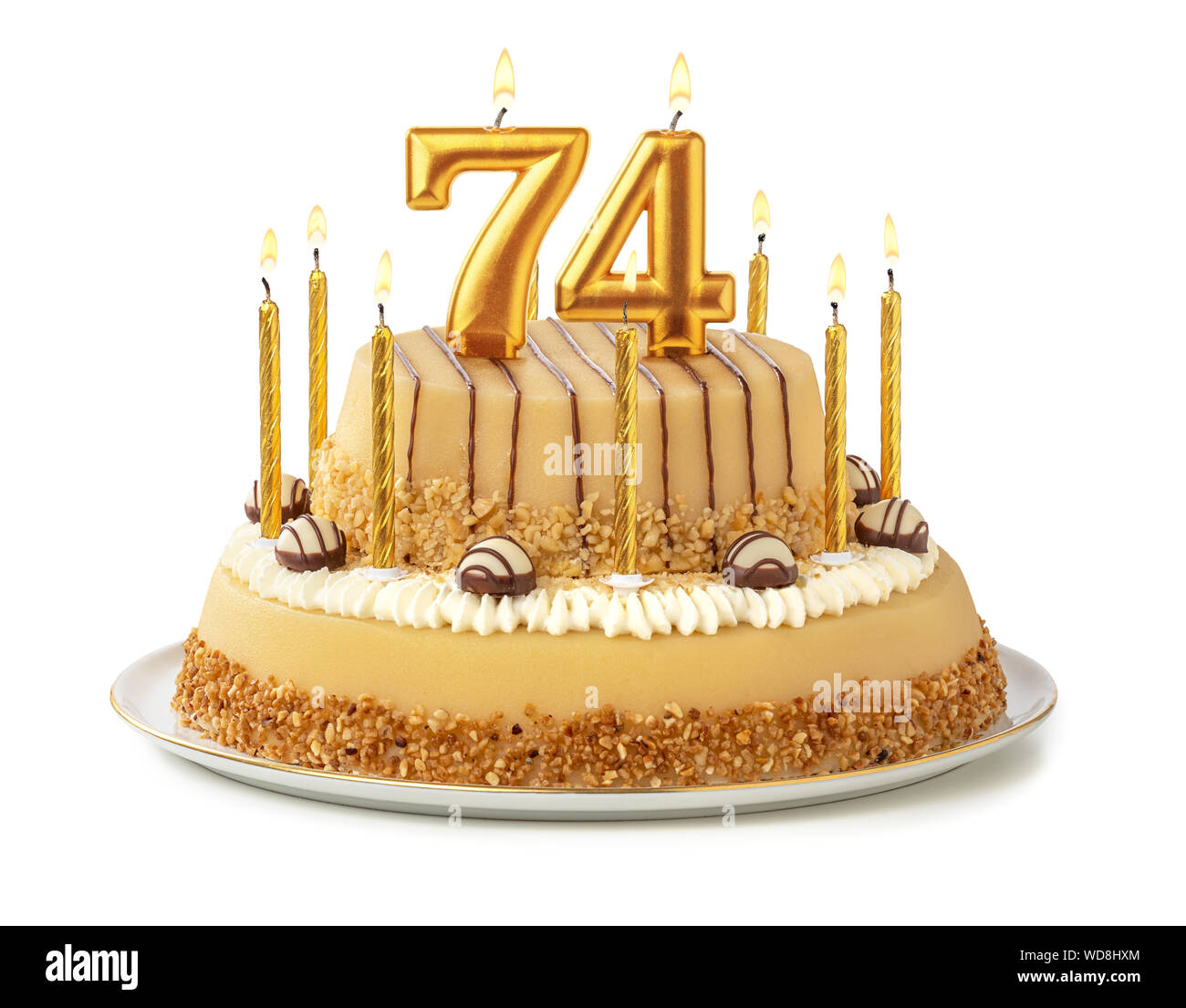 Festive cake with golden candles - Number 74 Stock Photo - Alamy