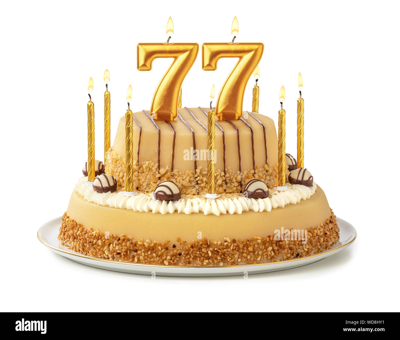 Festive cake with golden candles - Number 77 Stock Photo - Alamy