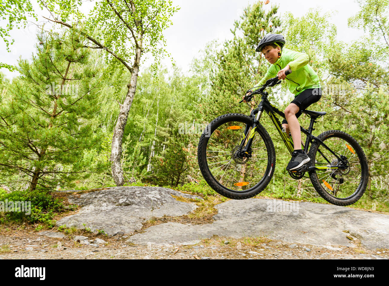 Boy riding Mountain Bike in Norway Stock Photo - Alamy