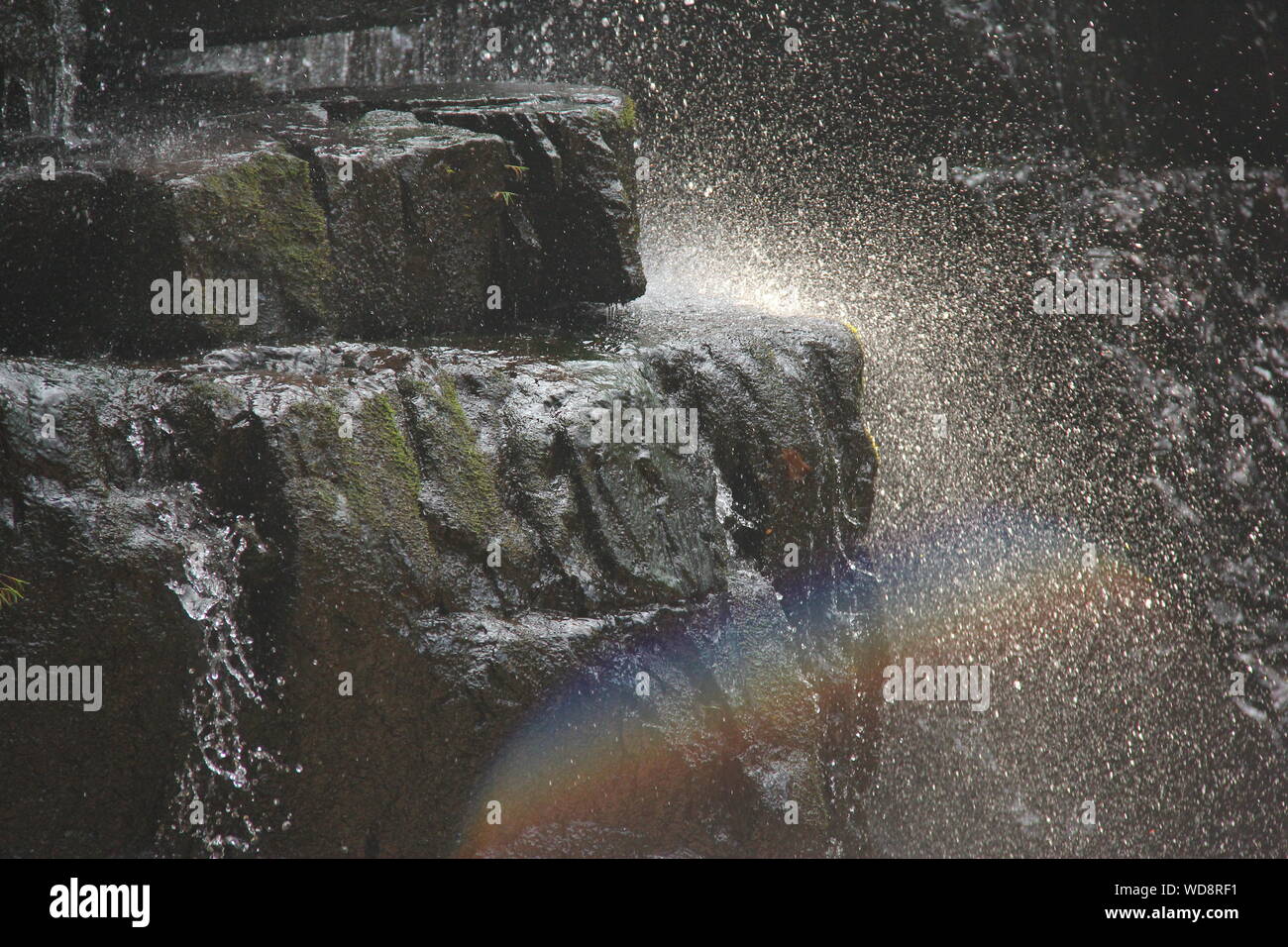 Water Splashing Rock Stock Photo - Alamy