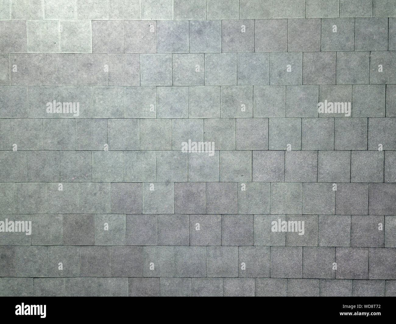 Background from texture of equal square rough gray plates. Decoration ...