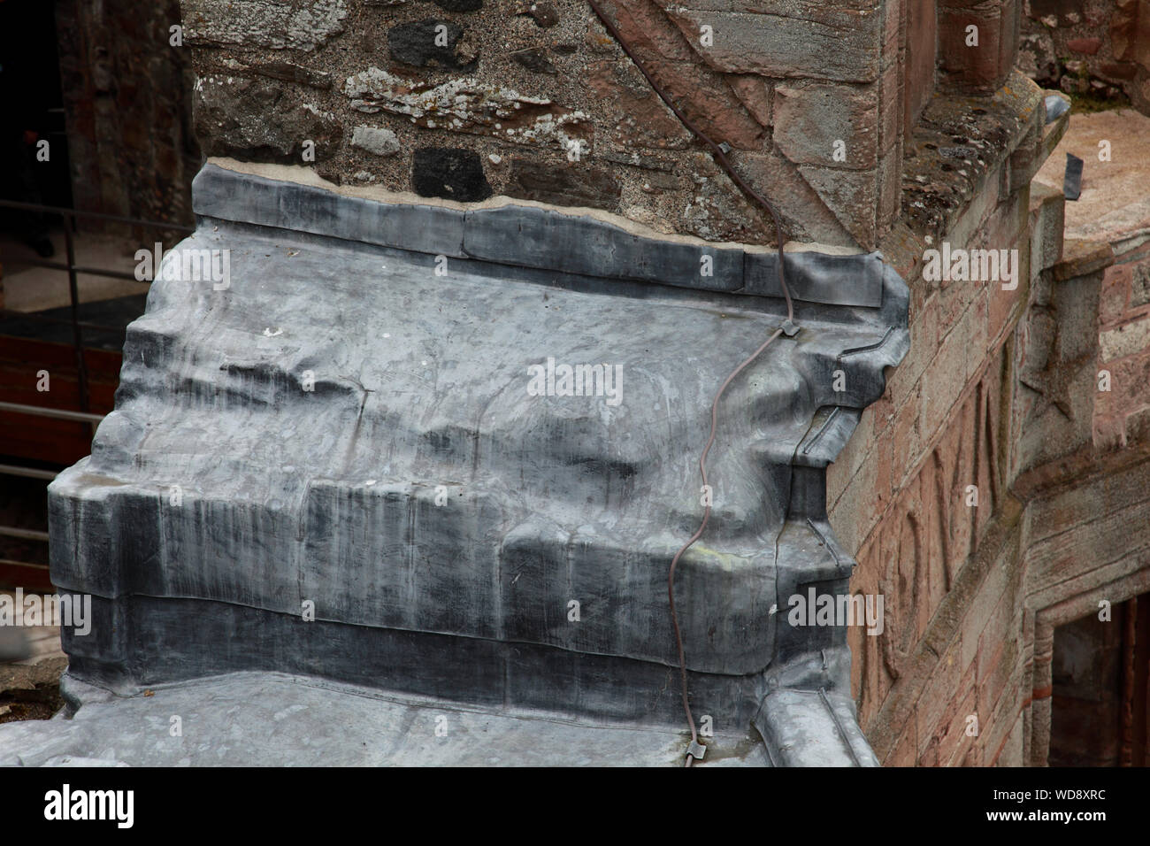 Lead flashing protecting part of the structure of a ruined Scottish ...