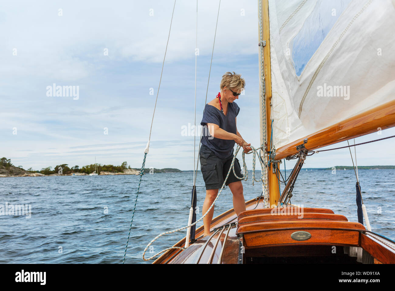 Woman sailing hi-res stock photography and images - Alamy