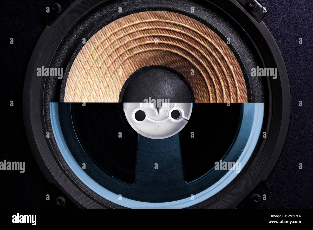 Music record production concept. Head of loudspeaker overlaid by tape ...