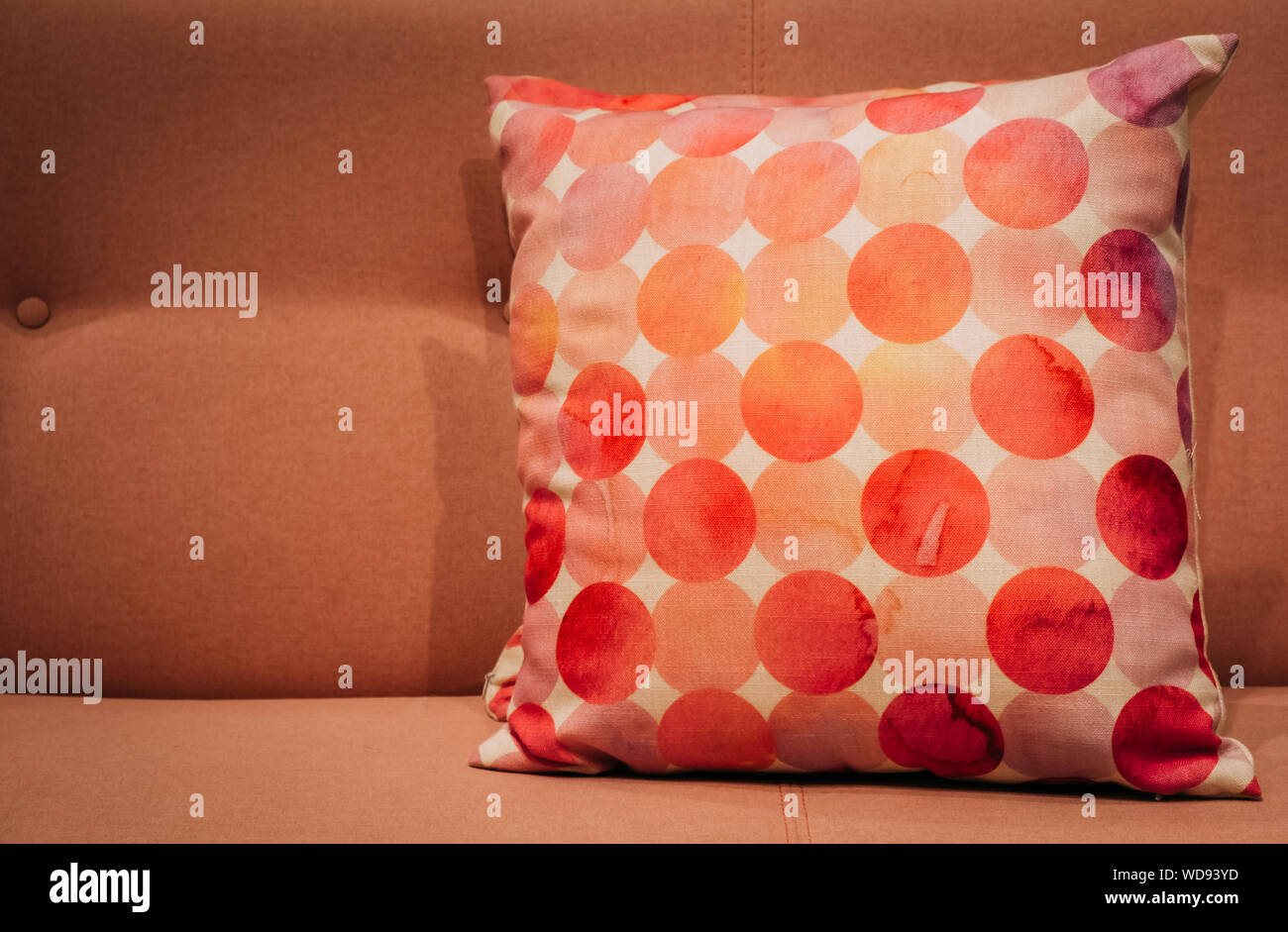red dot color Pillows on sofa in room Stock Photo - Alamy