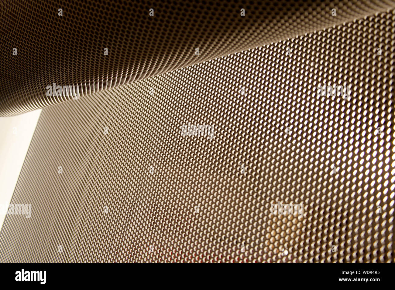 Colorful and perforated plastic grid Stock Photo - Alamy