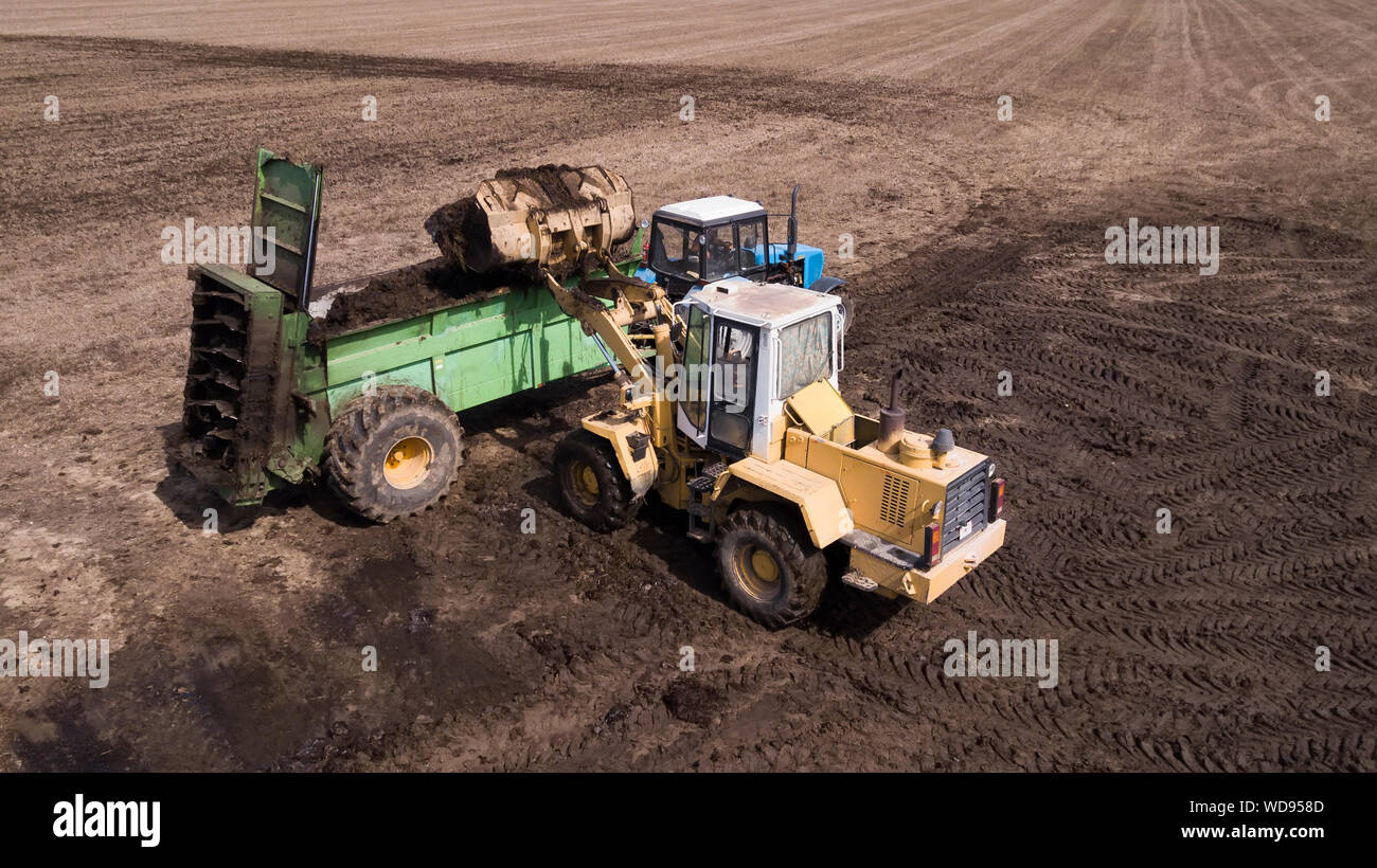 Dredger with natural manure loading trailer for field fertilization ...