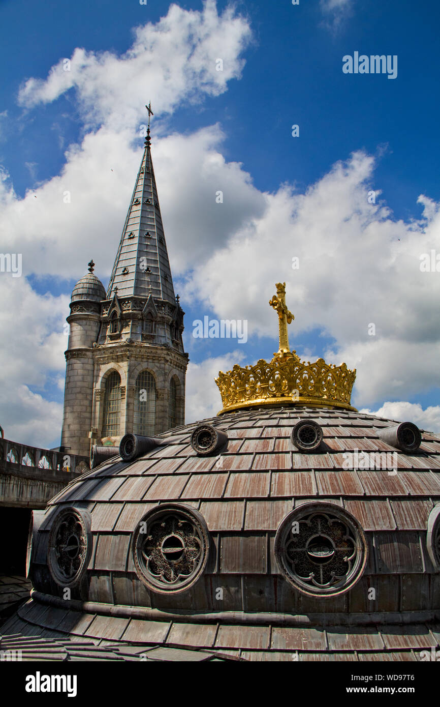 Golden crown on the Basilica of the Immaculate Conception in Lourdes ...