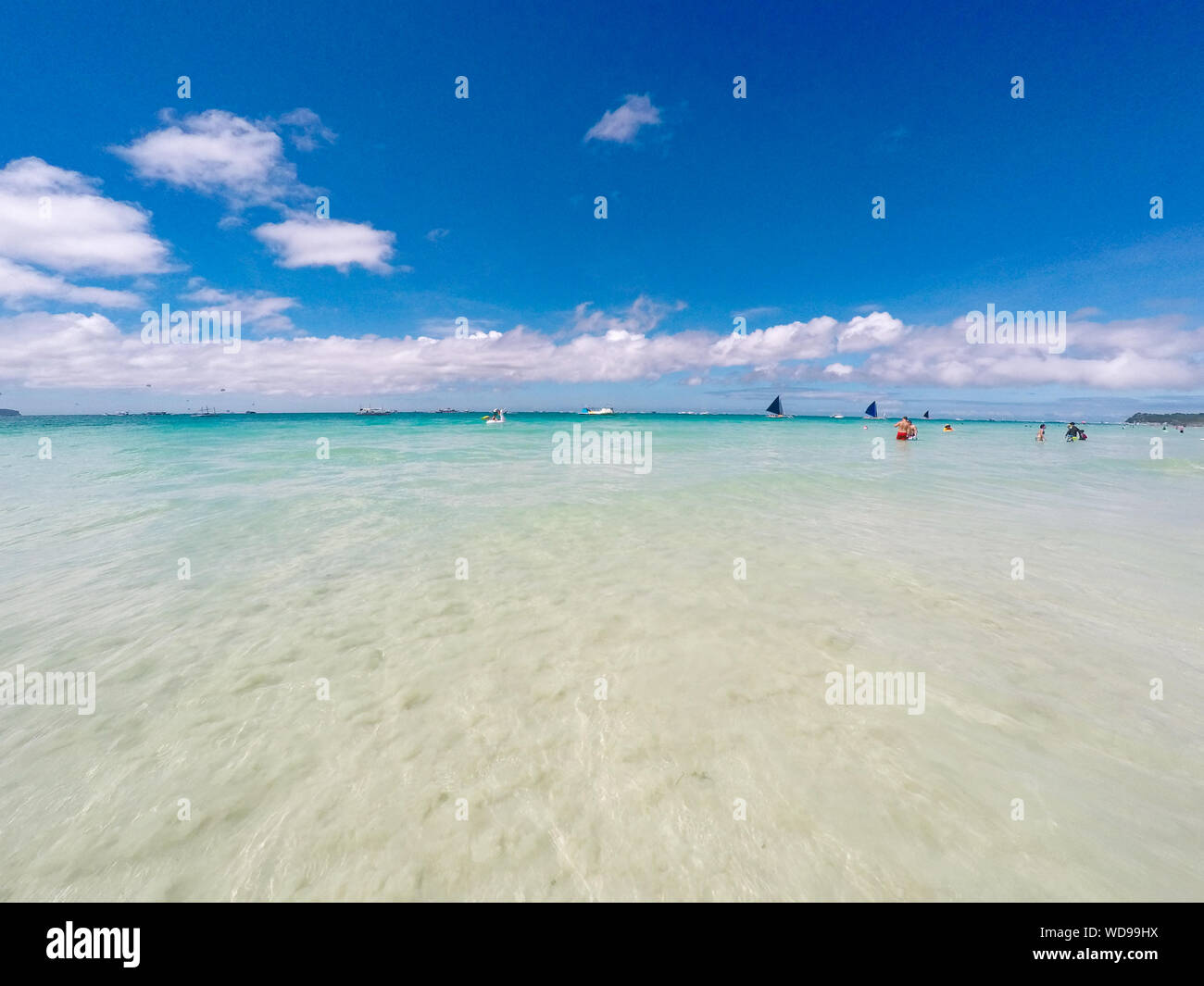 White beaches of Boracay Philippines. Turquoise sea. Green palm trees ...