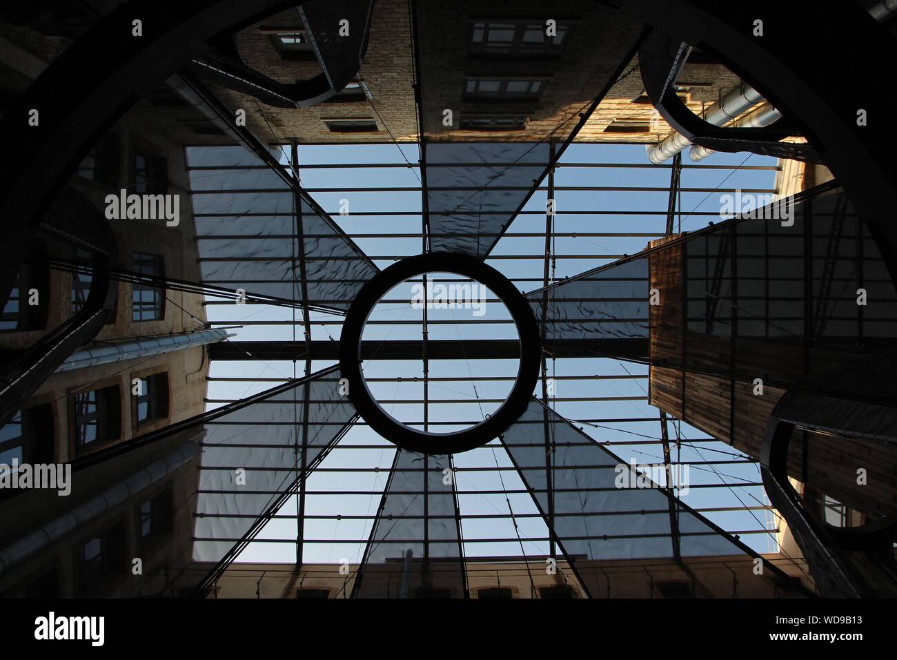 Low angle shot of the rooftop of a high rise building Stock Photo - Alamy