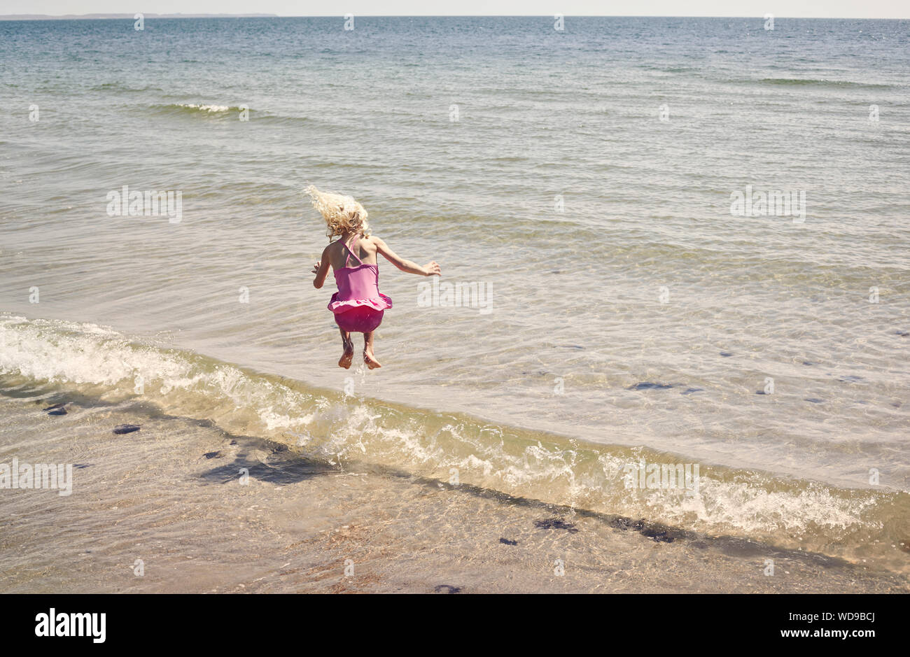 Wave on beach hi-res stock photography and images - Alamy