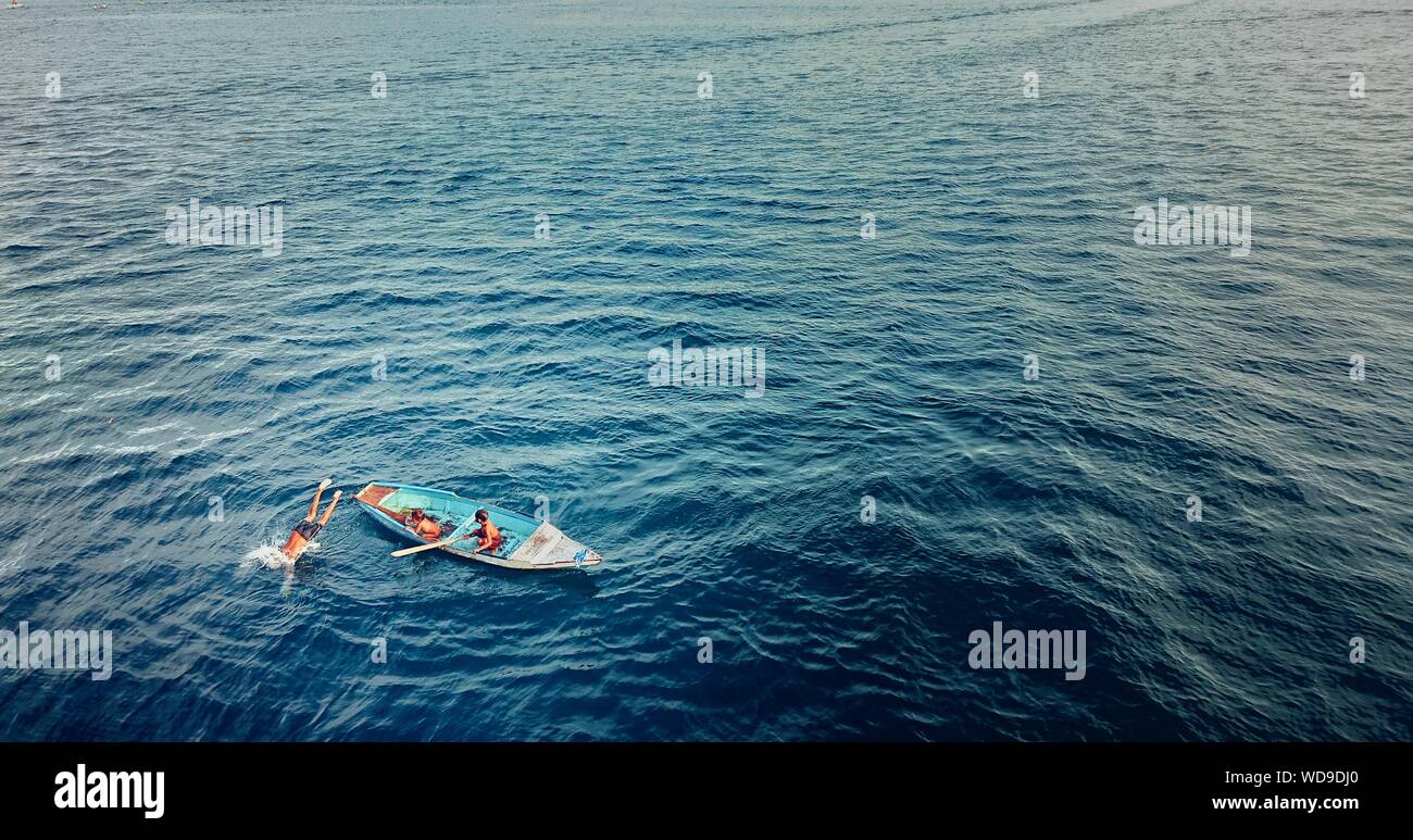 People jumping boat hi-res stock photography and images - Alamy