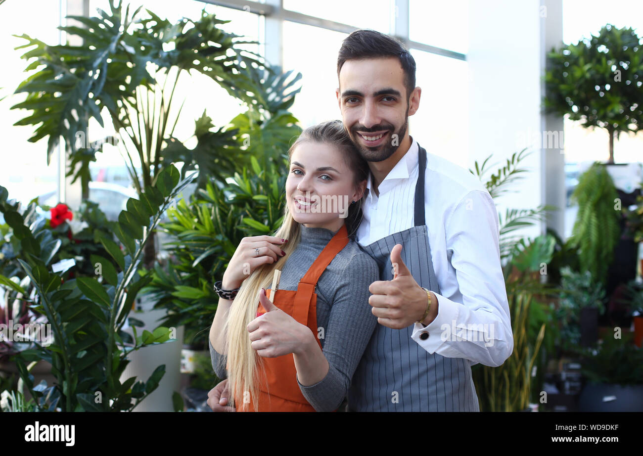 Florist Man and Woman at Domestic Flower Shop Stock Photo - Alamy