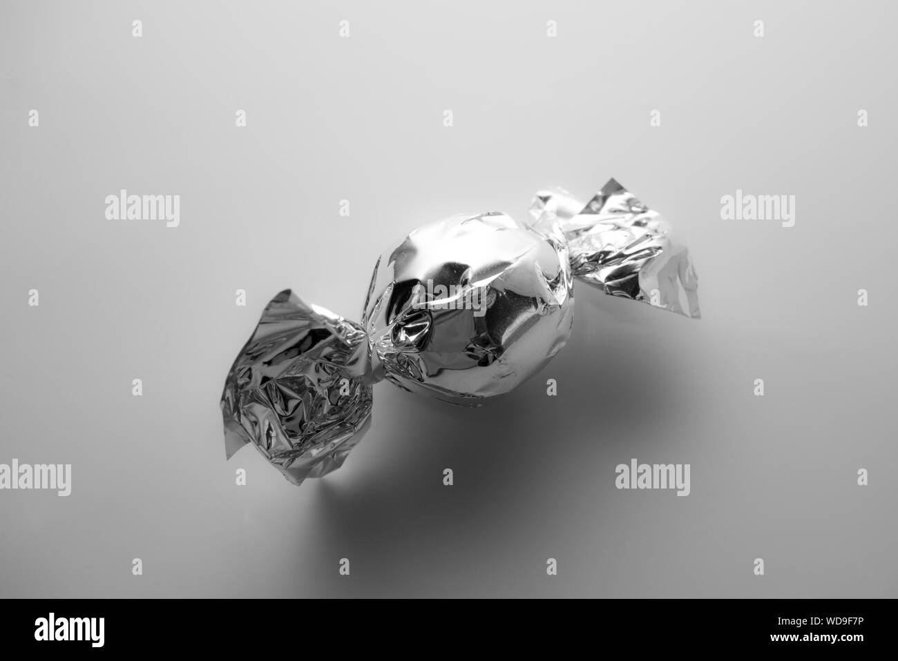 Foil wrapper Black and White Stock Photos & Images - Alamy