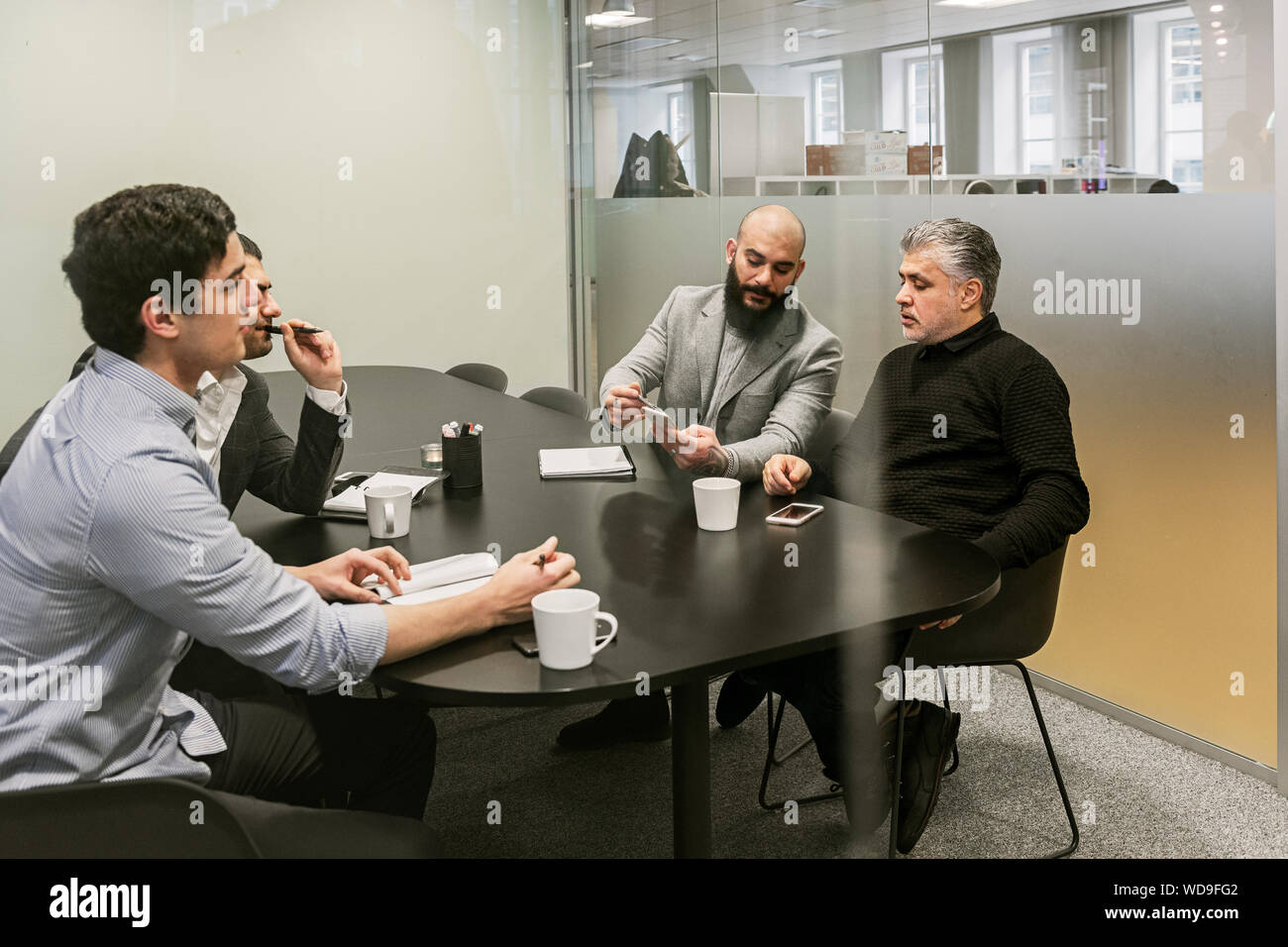 Boardroom meeting men hi-res stock photography and images - Alamy