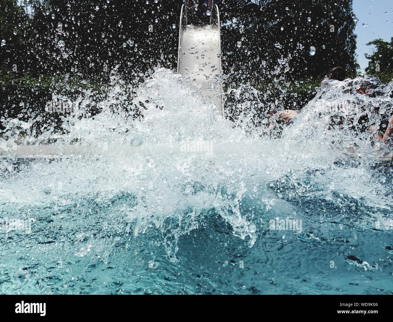 Water splashing into pool hi-res stock photography and images - Alamy