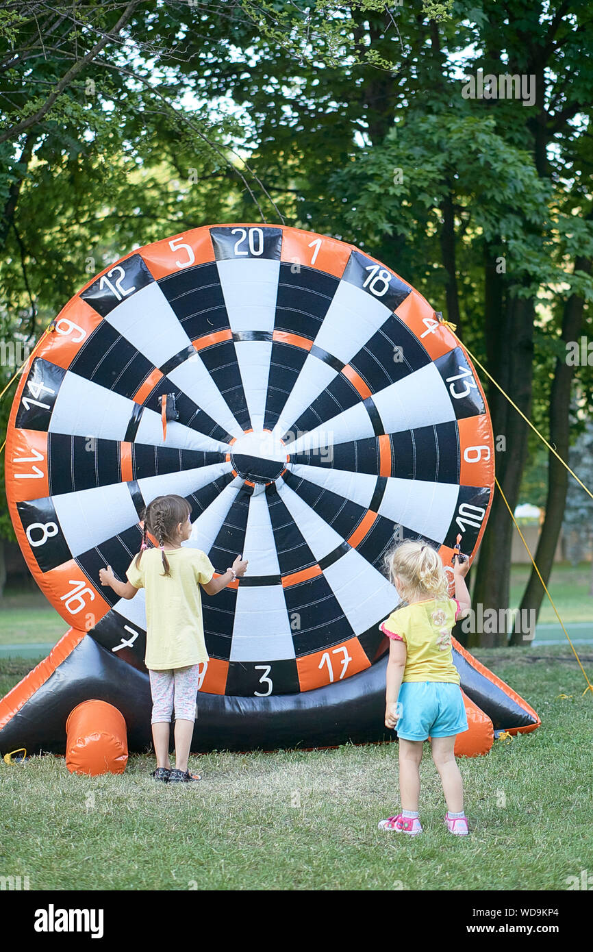 Two girls playing in the park hi-res stock photography and images - Alamy