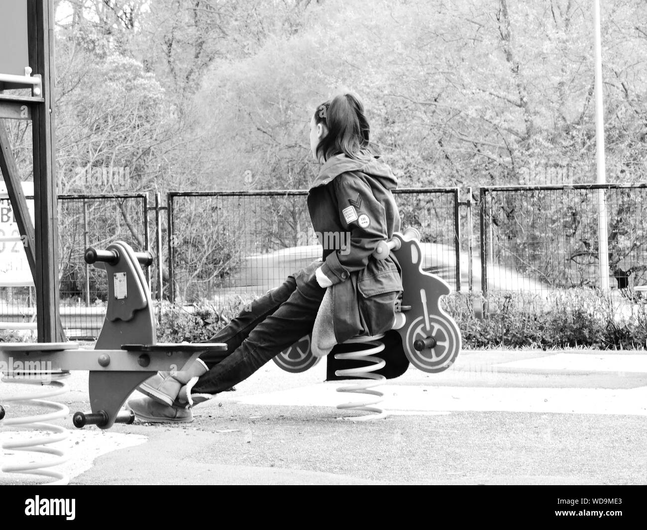 Women crossed legs Black and White Stock Photos & Images - Alamy