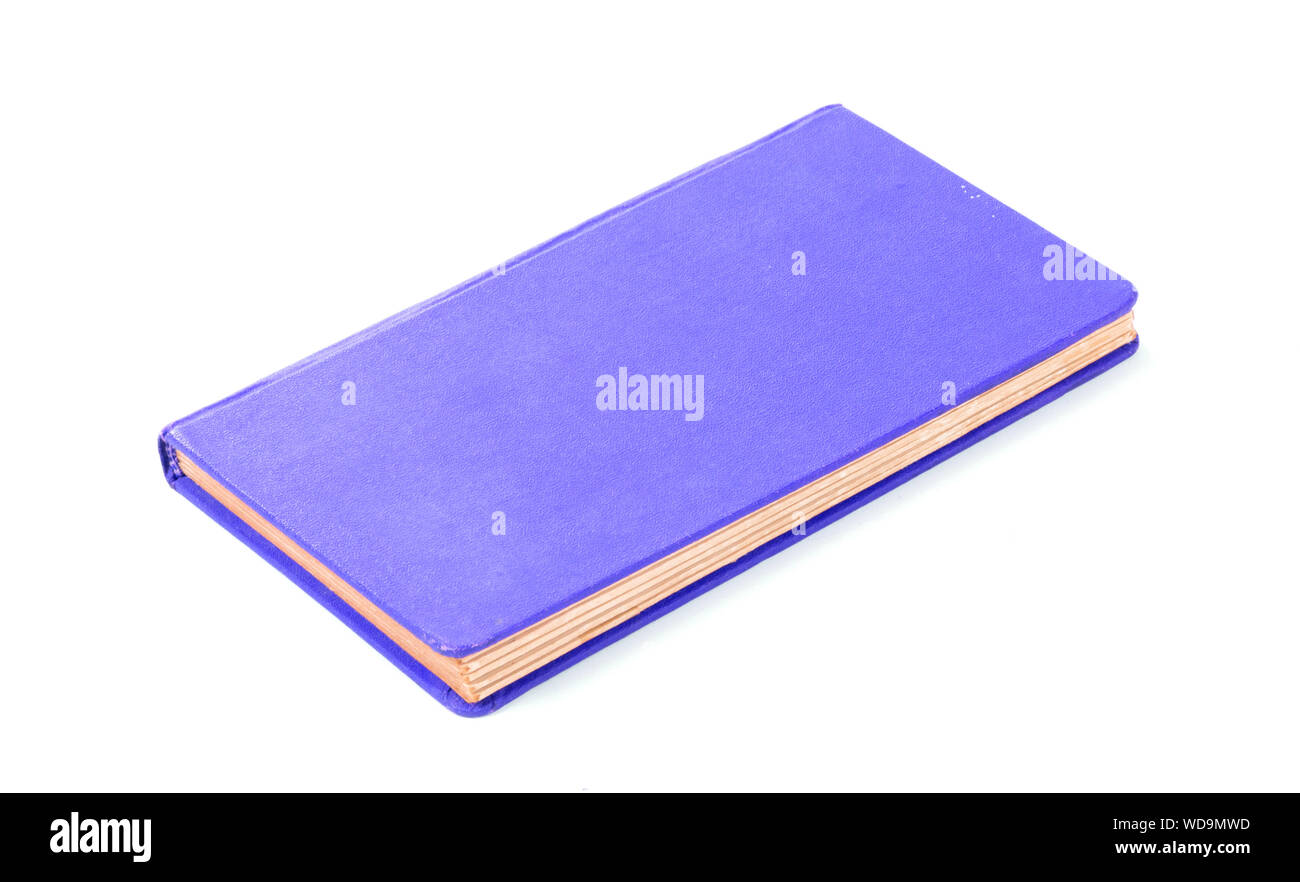 Closed old purple book isolated on white background Stock Photo - Alamy