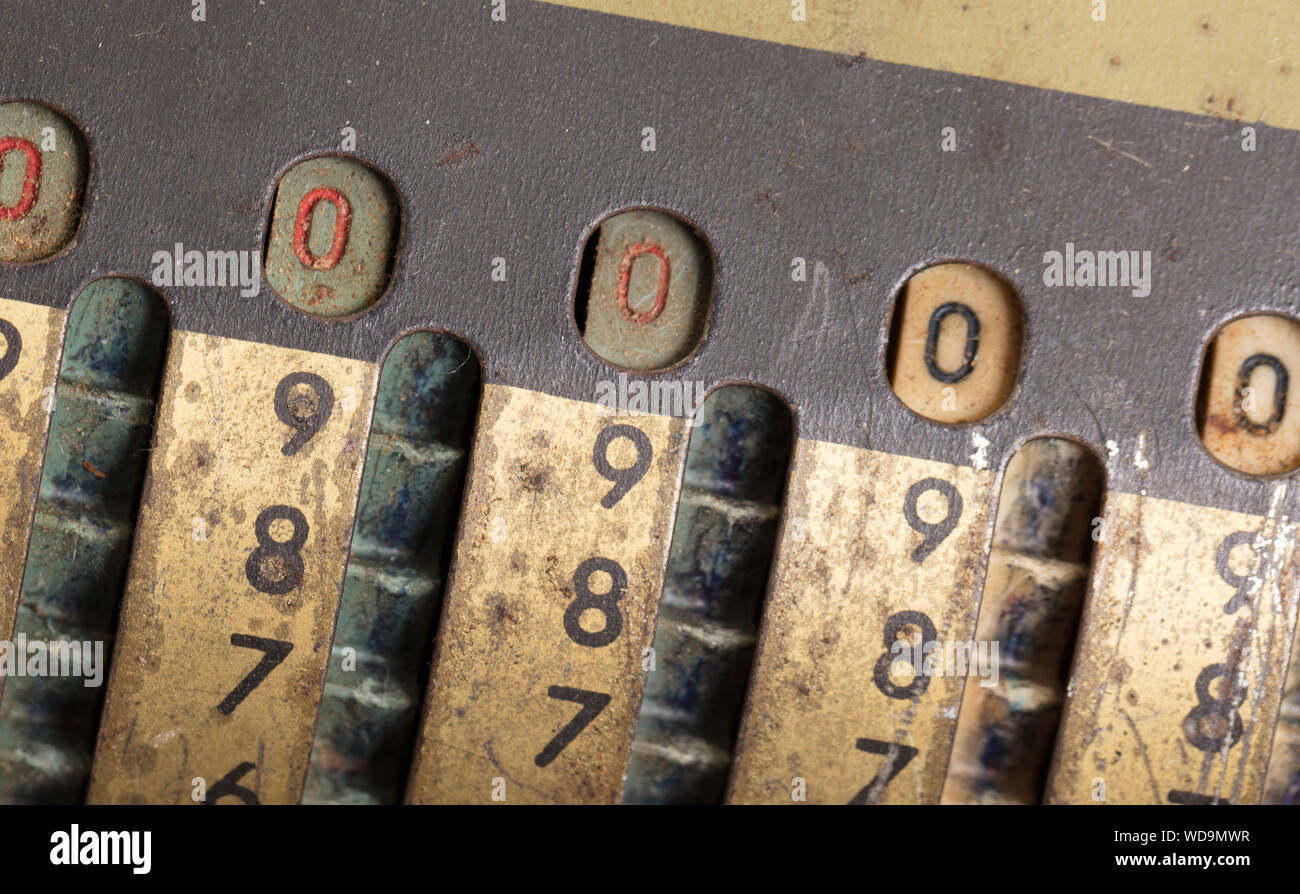 Vintage manual adding machine isolated, selective focus Stock Photo - Alamy