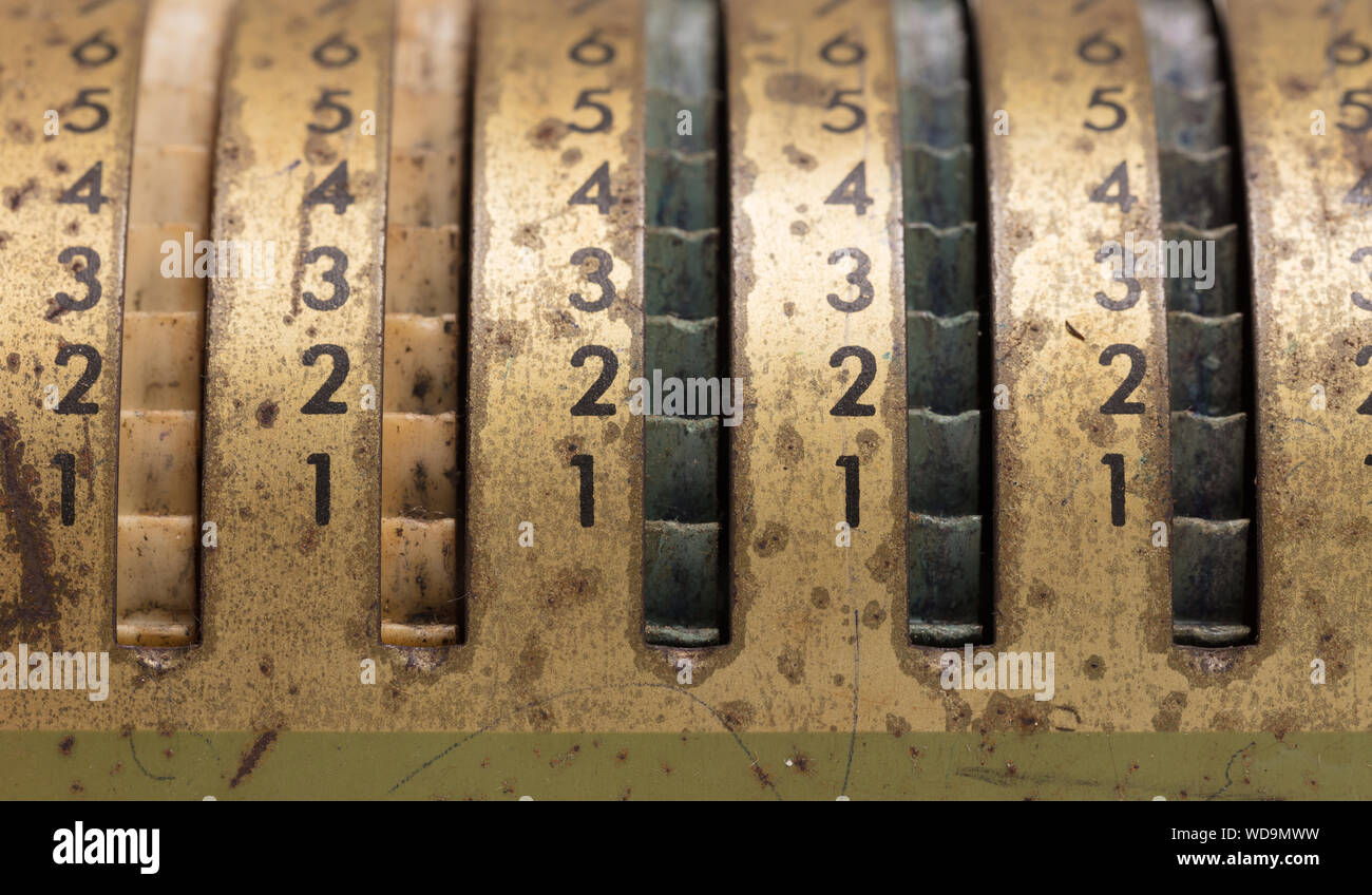 Vintage manual adding machine isolated, selective focus Stock Photo - Alamy