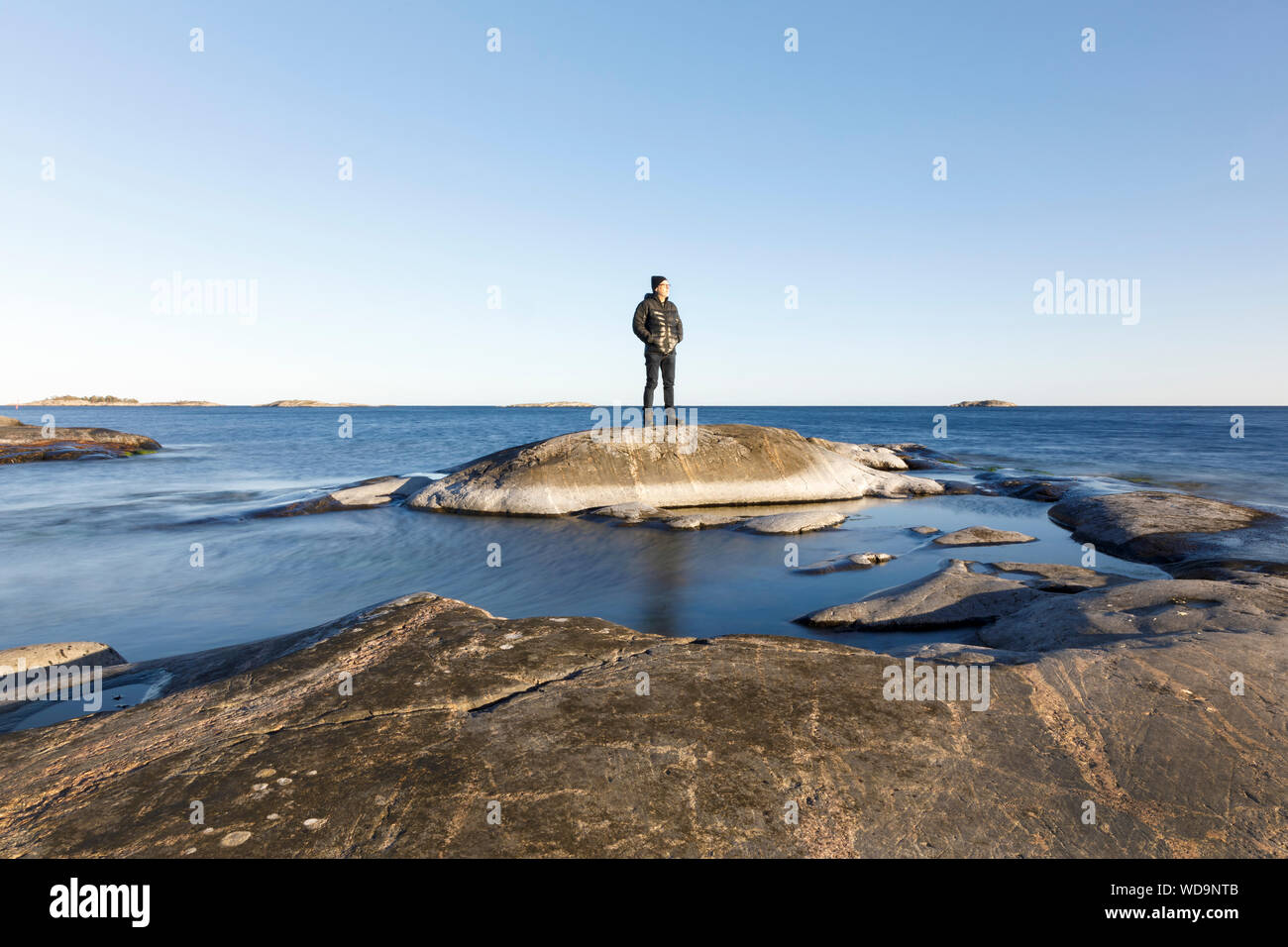 Man standing rock formation hi-res stock photography and images - Alamy