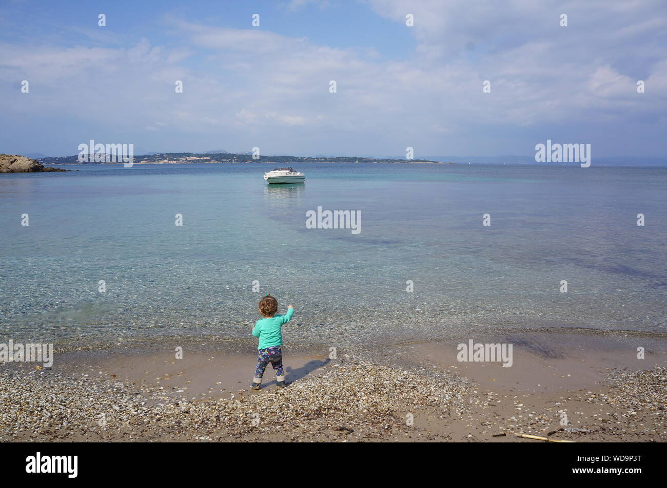 Baby girl rear view hi-res stock photography and images - Alamy
