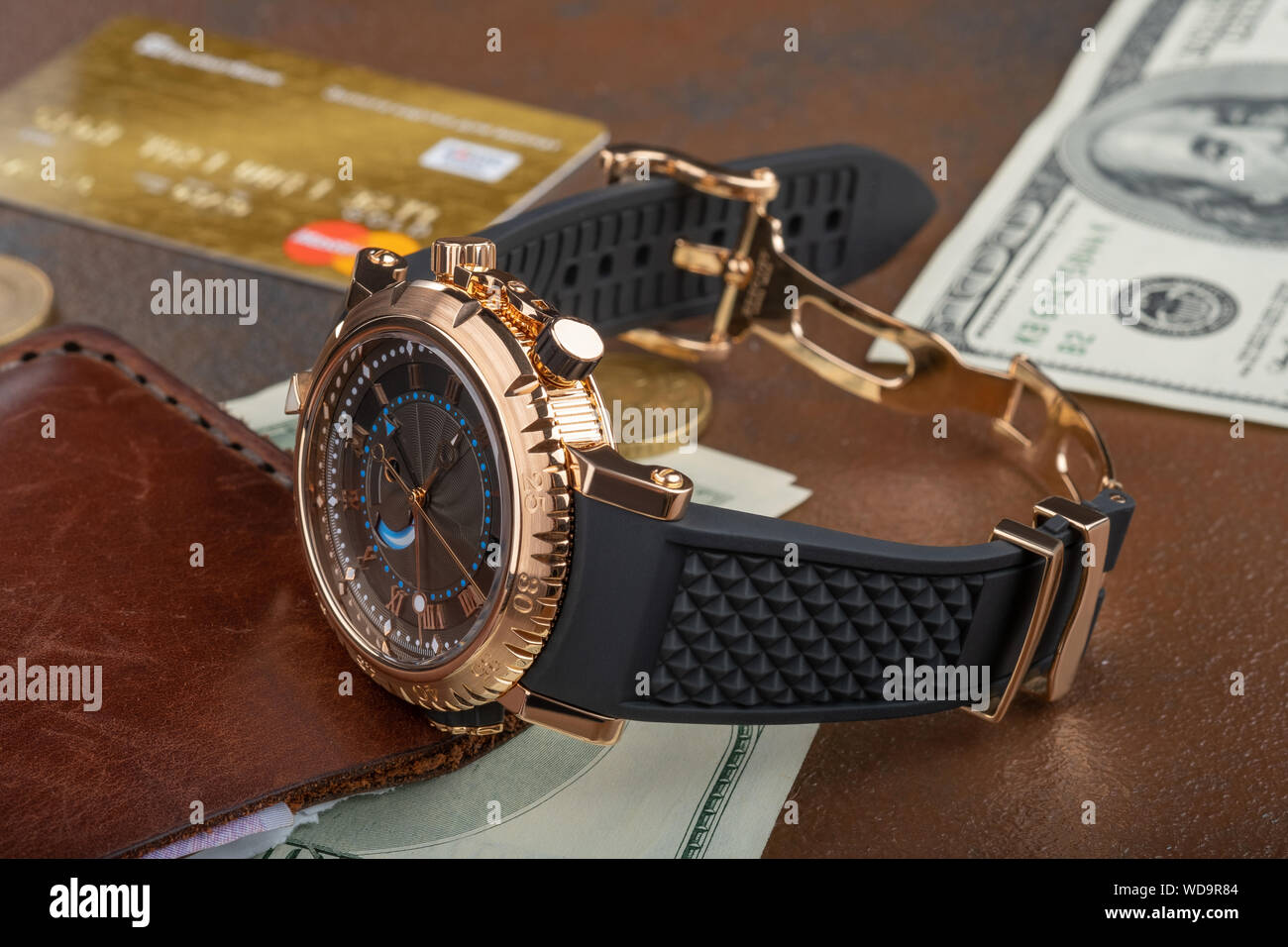 'Time is money' concept, credit card, Wrist Watch with roman dial ...