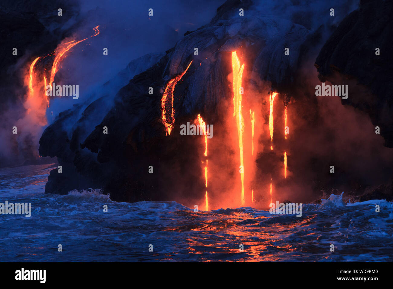 Lava flowing into the ocean hi-res stock photography and images - Alamy