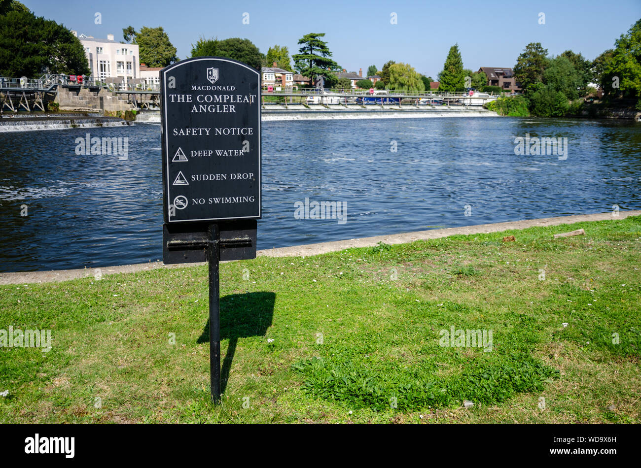 A warning sign near the Marlow weir on The River Thames warns people of ...
