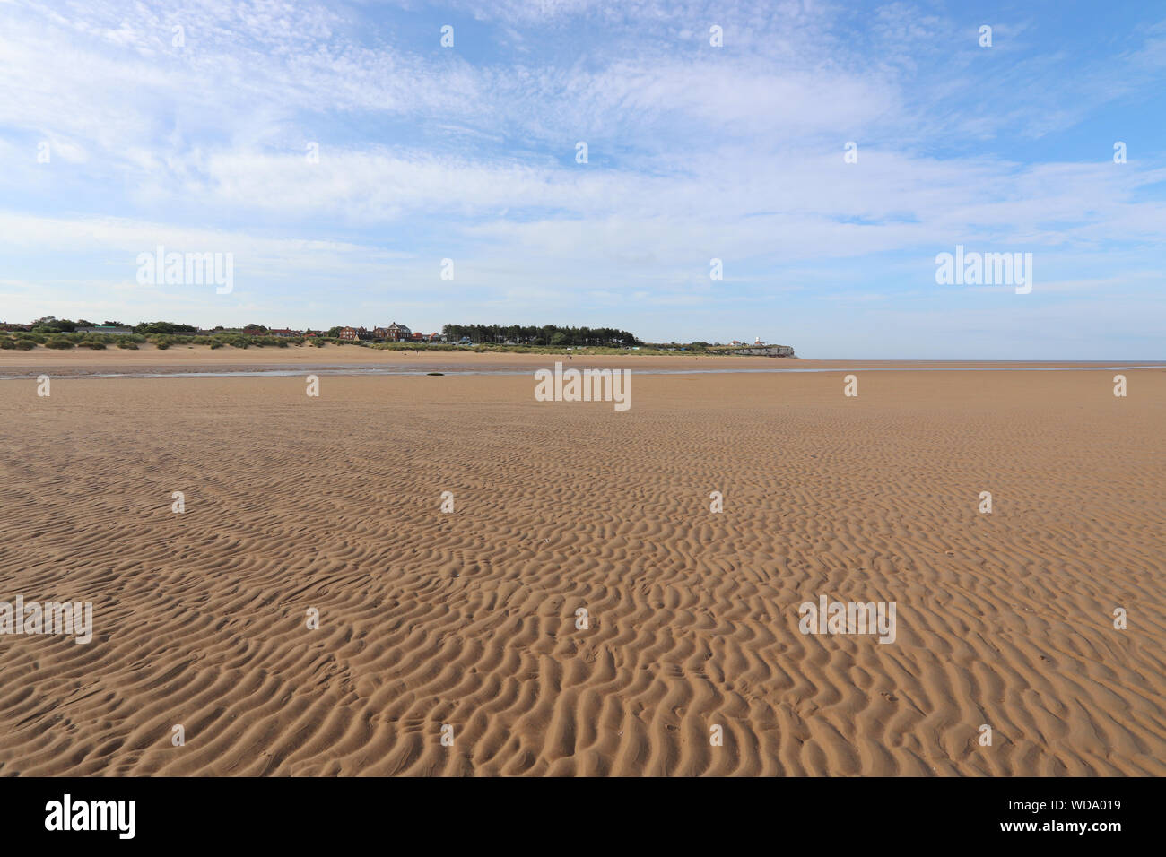 A view of Old Hunstanton Beach with blue skies on a sunny day Stock ...