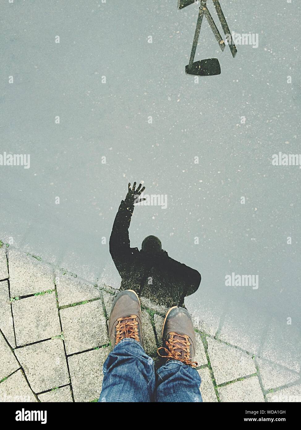 Man puddle hi-res stock photography and images - Alamy