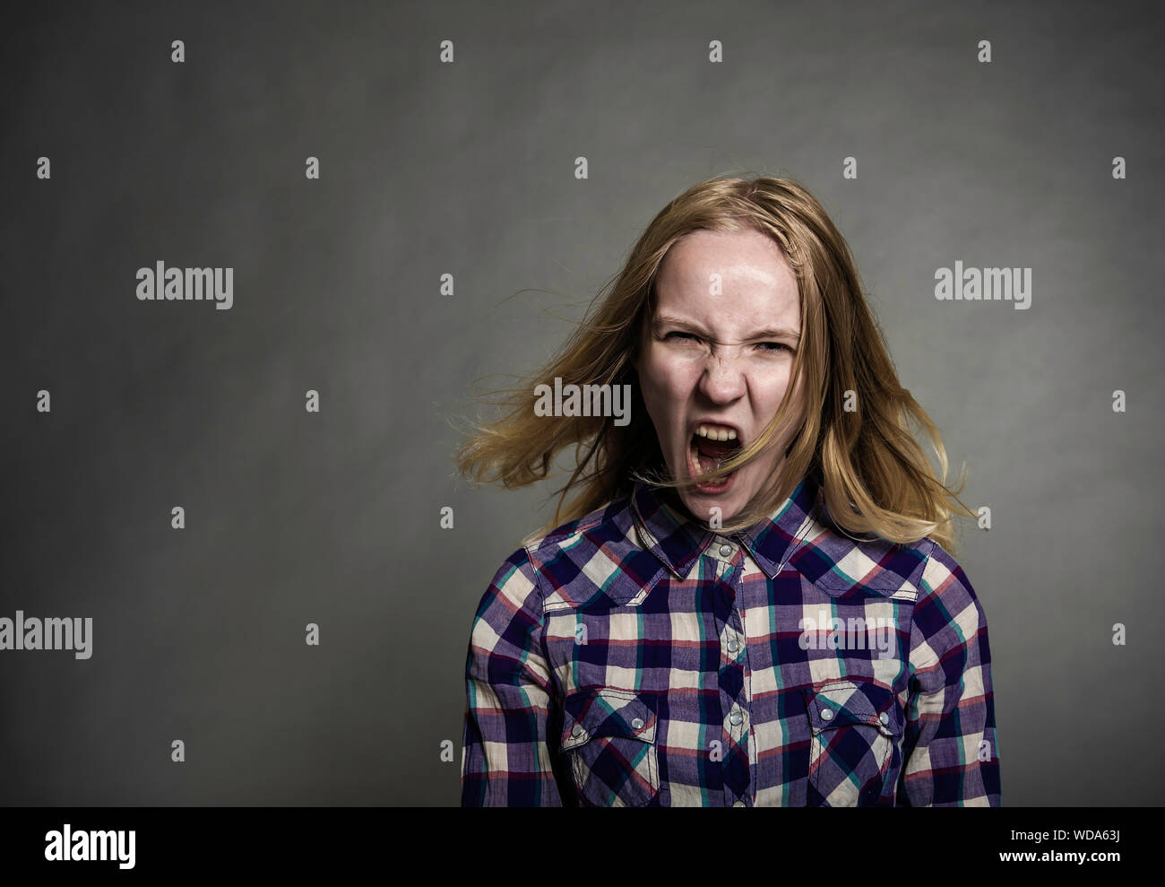 People shouting angry hi-res stock photography and images - Alamy