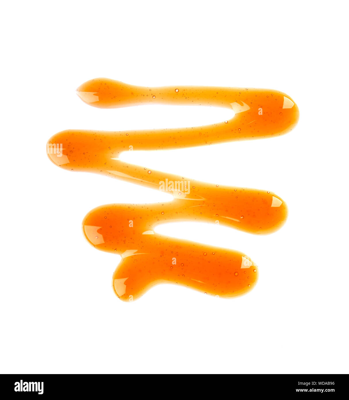 Caramel Syrup Drizzle Isolated On White Background Splashes Of Sweet