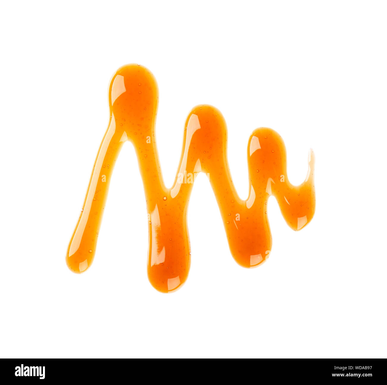 Caramel Syrup Drizzle Isolated On White Background Splashes Of Sweet