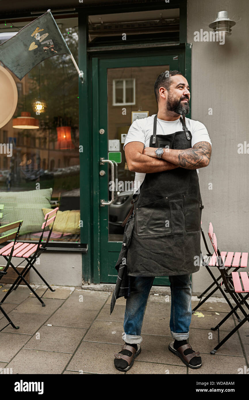 Cafe owner outside cafe hi-res stock photography and images - Alamy