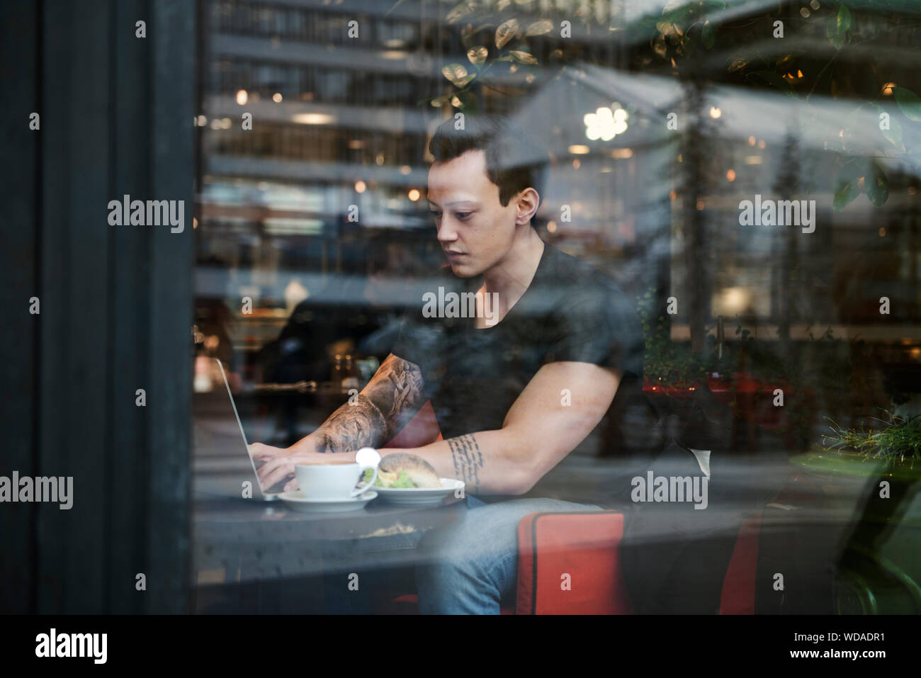 Man behind the window hi-res stock photography and images - Alamy