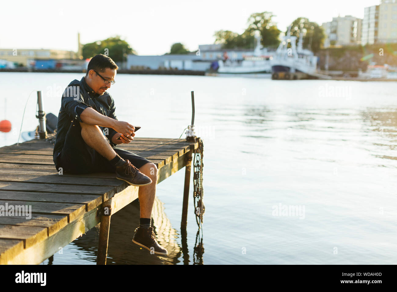 Sitting smart man hi-res stock photography and images - Alamy